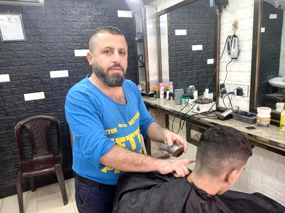 A barber shop turns into meeting point for Alqush residents